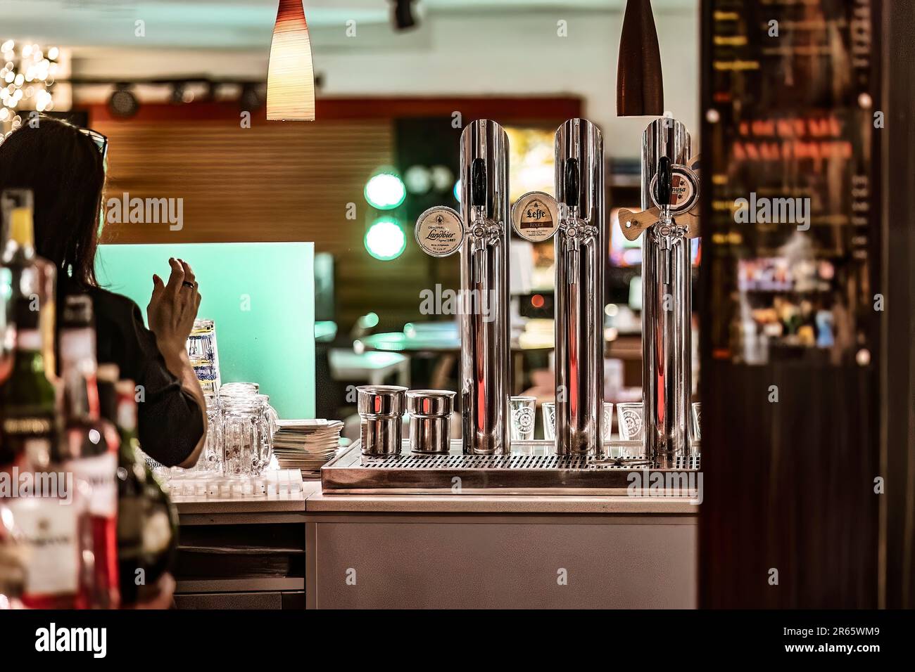 Masi, Italy 7 june 2023: A photo showcasing a bar counter with multiple beer taps ready to pour ...
