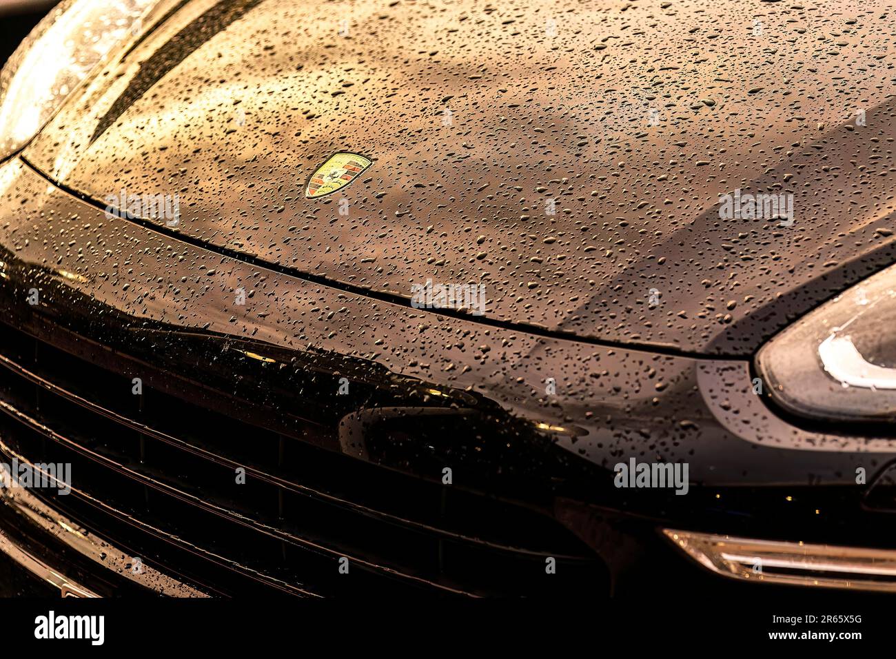 Masi, Italy 7 june 2023: Luxurious black car with waterdrops covering ...