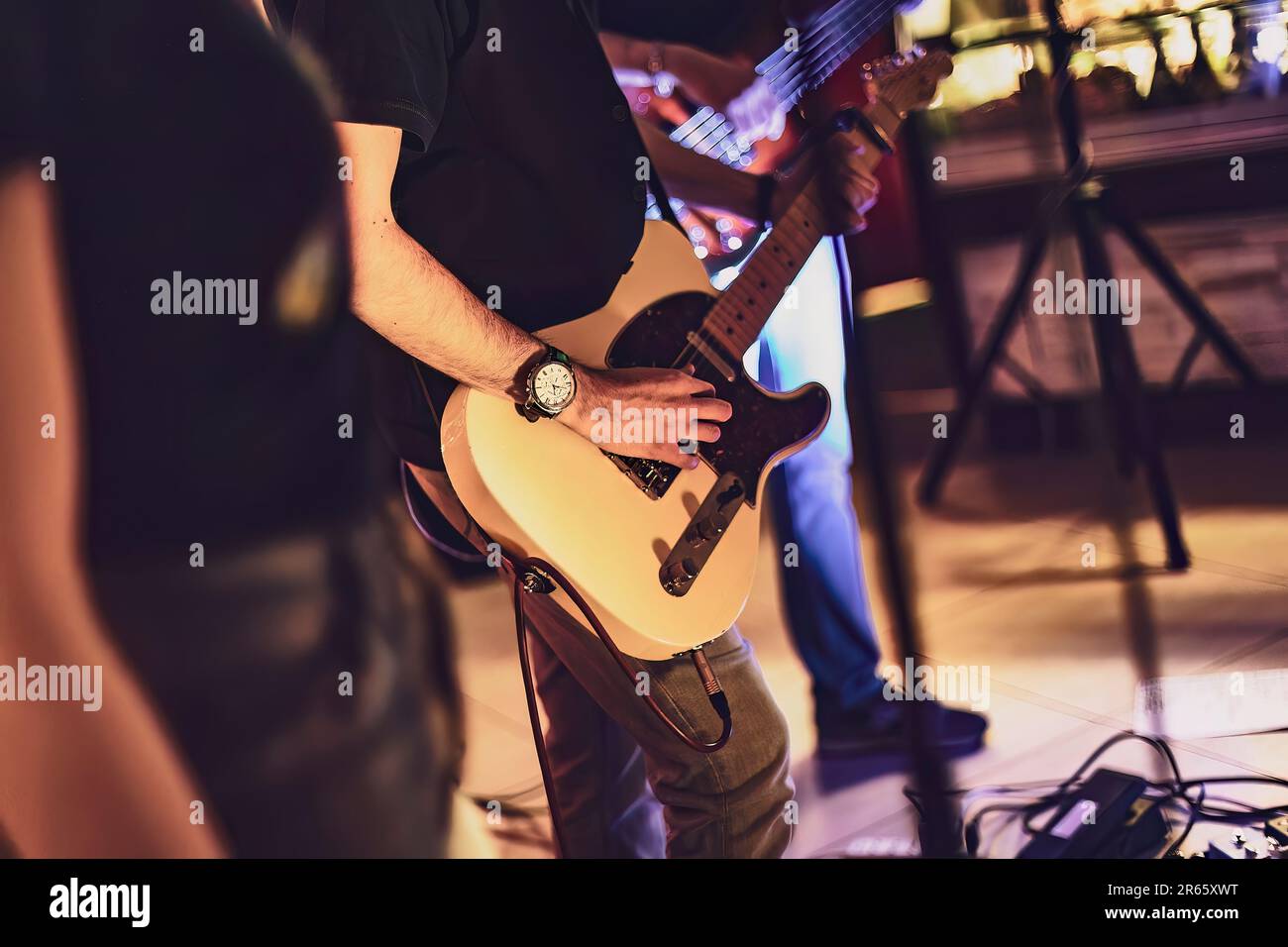 Close-up shot capturing the intricate movements of a hand playing an ...