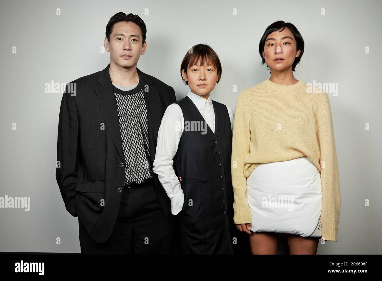Teo Yoo, from left, director Celine Song and Greta Lee pose for a ...