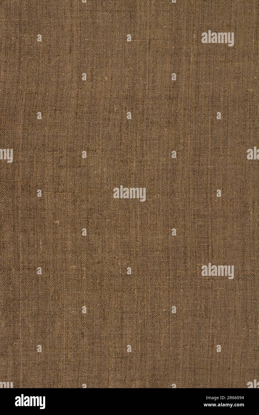 Natural linen fabric, background or texture, toned in brown color, top ...