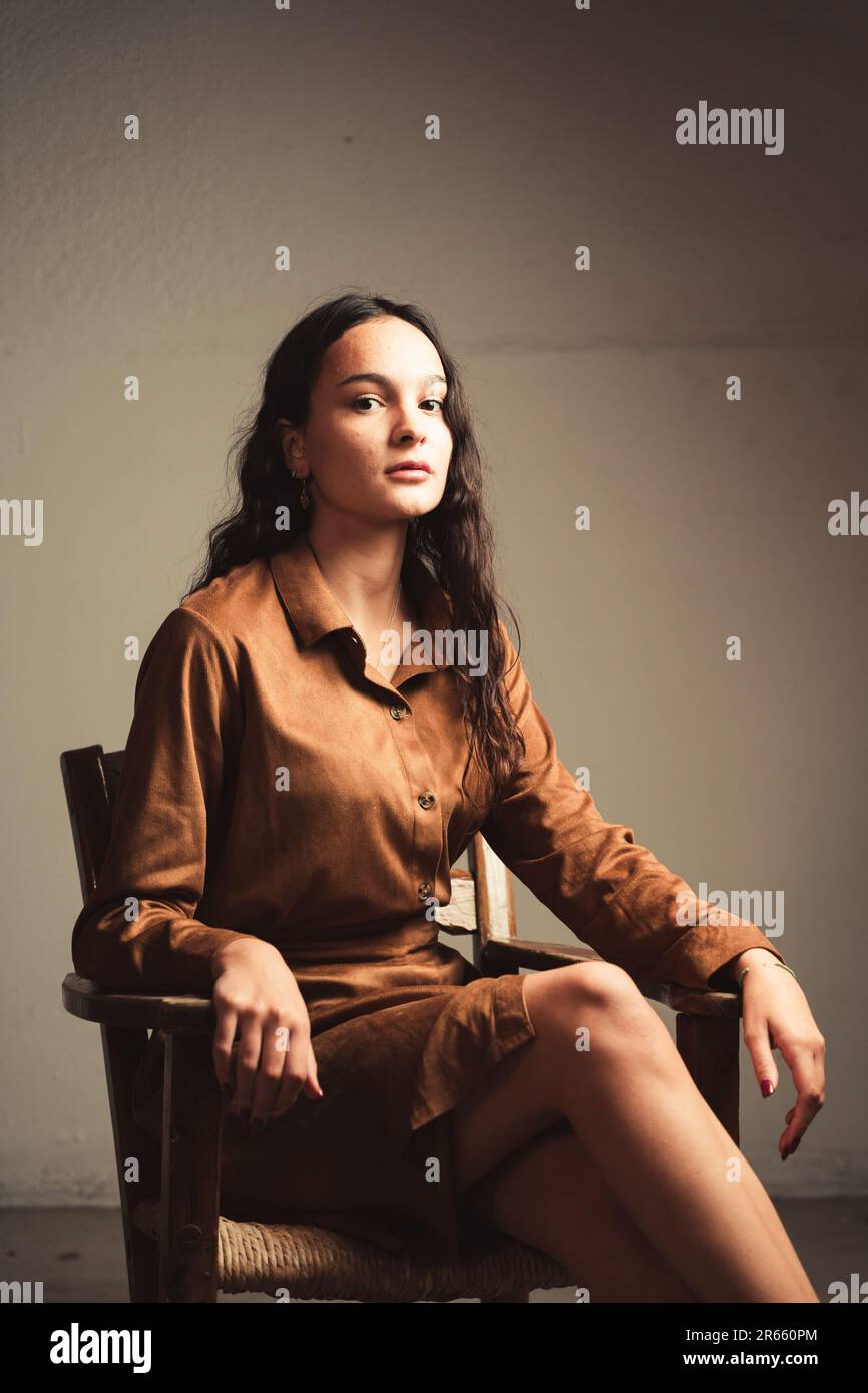 Seated legs crossed hi-res stock photography and images - Alamy