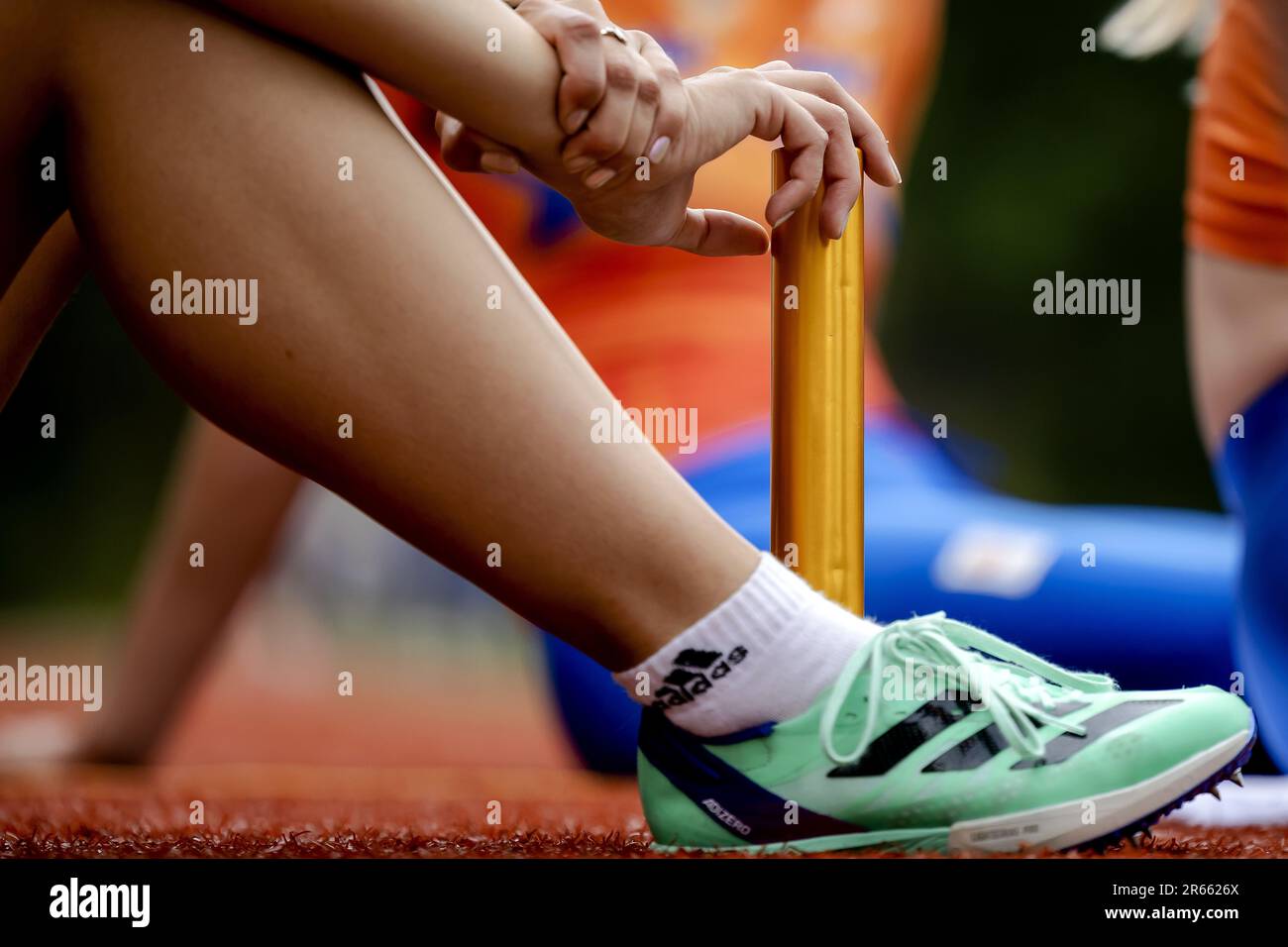 ARNHEM - A relay baton during a training of the 4x100 relay runners at ...