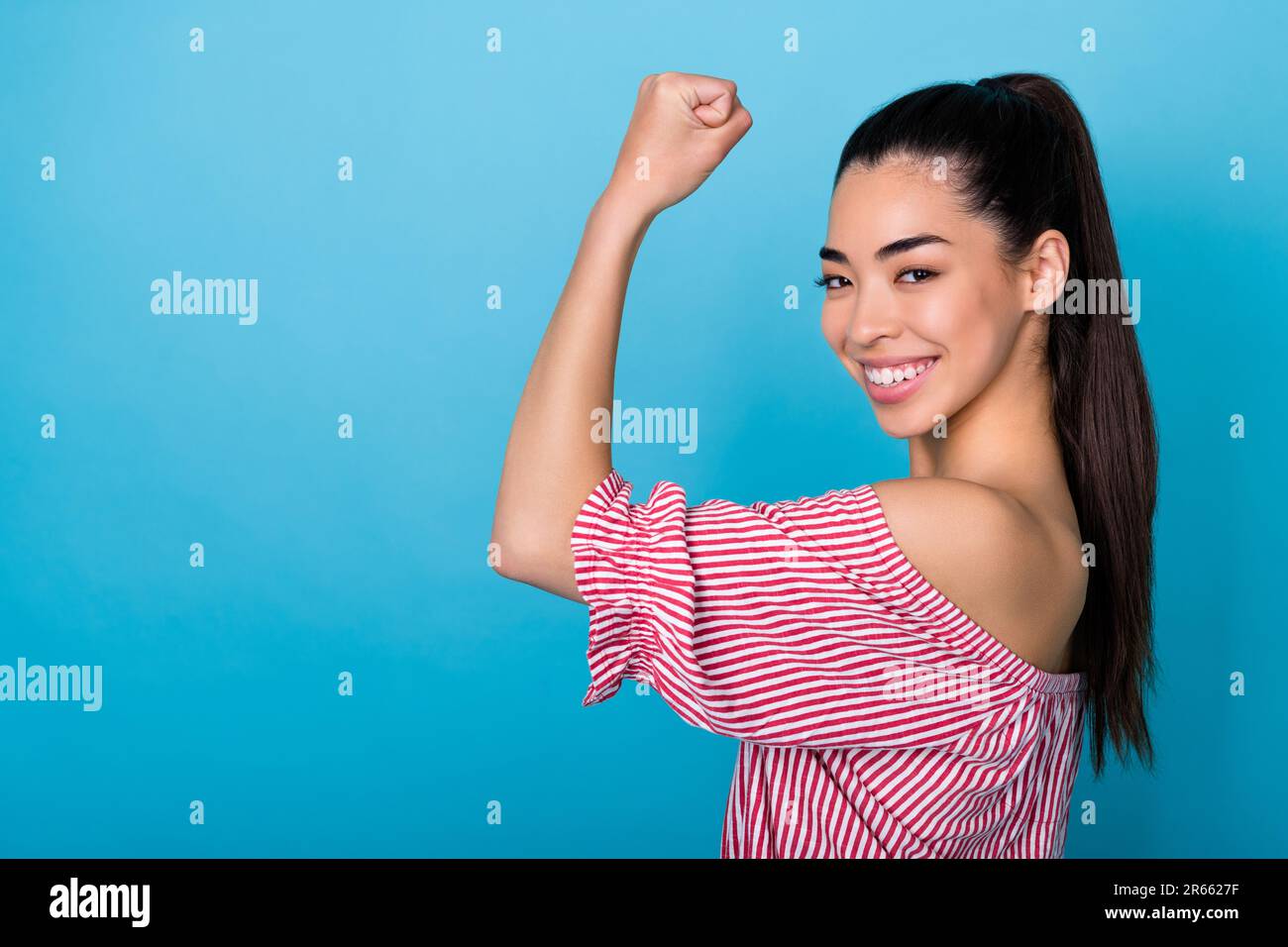 Photo of funky strong lady wear off shoulders red blouse showing arm ...