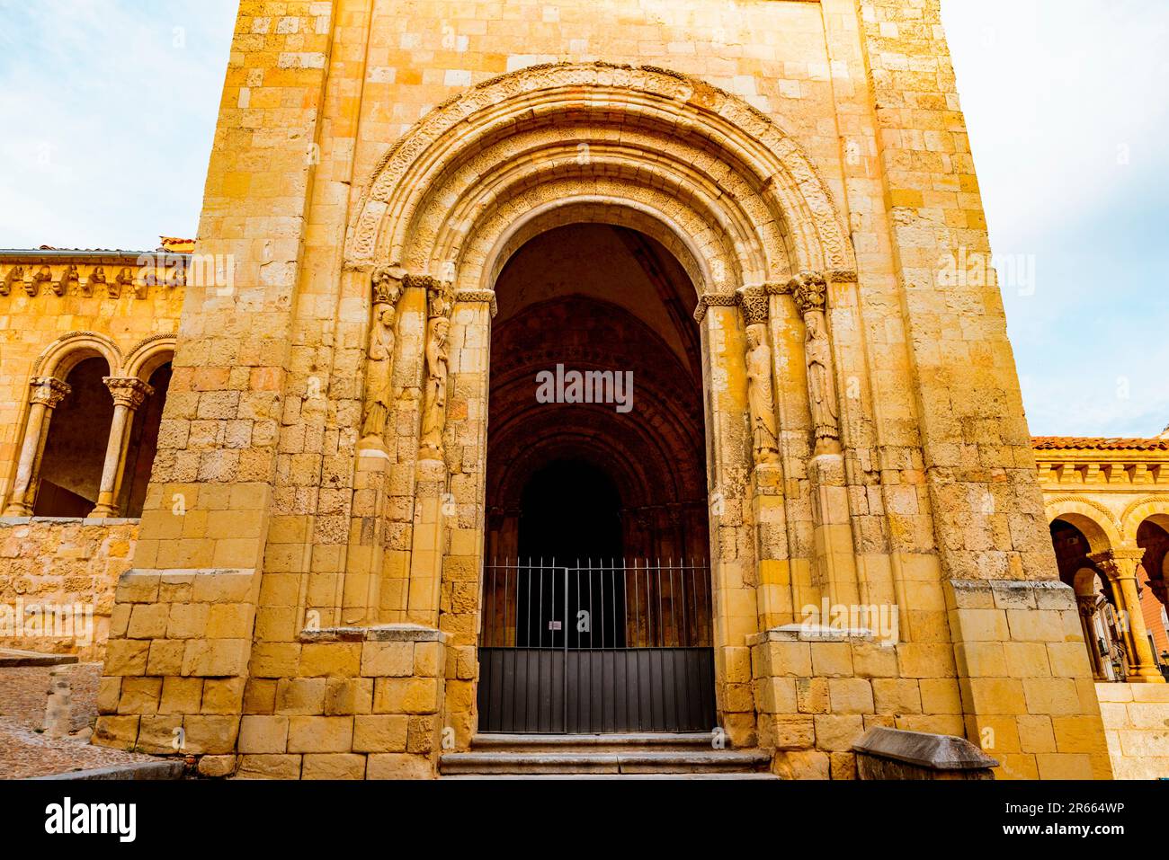Detail of the Romanesque portal, archivolts supported by human statues ...