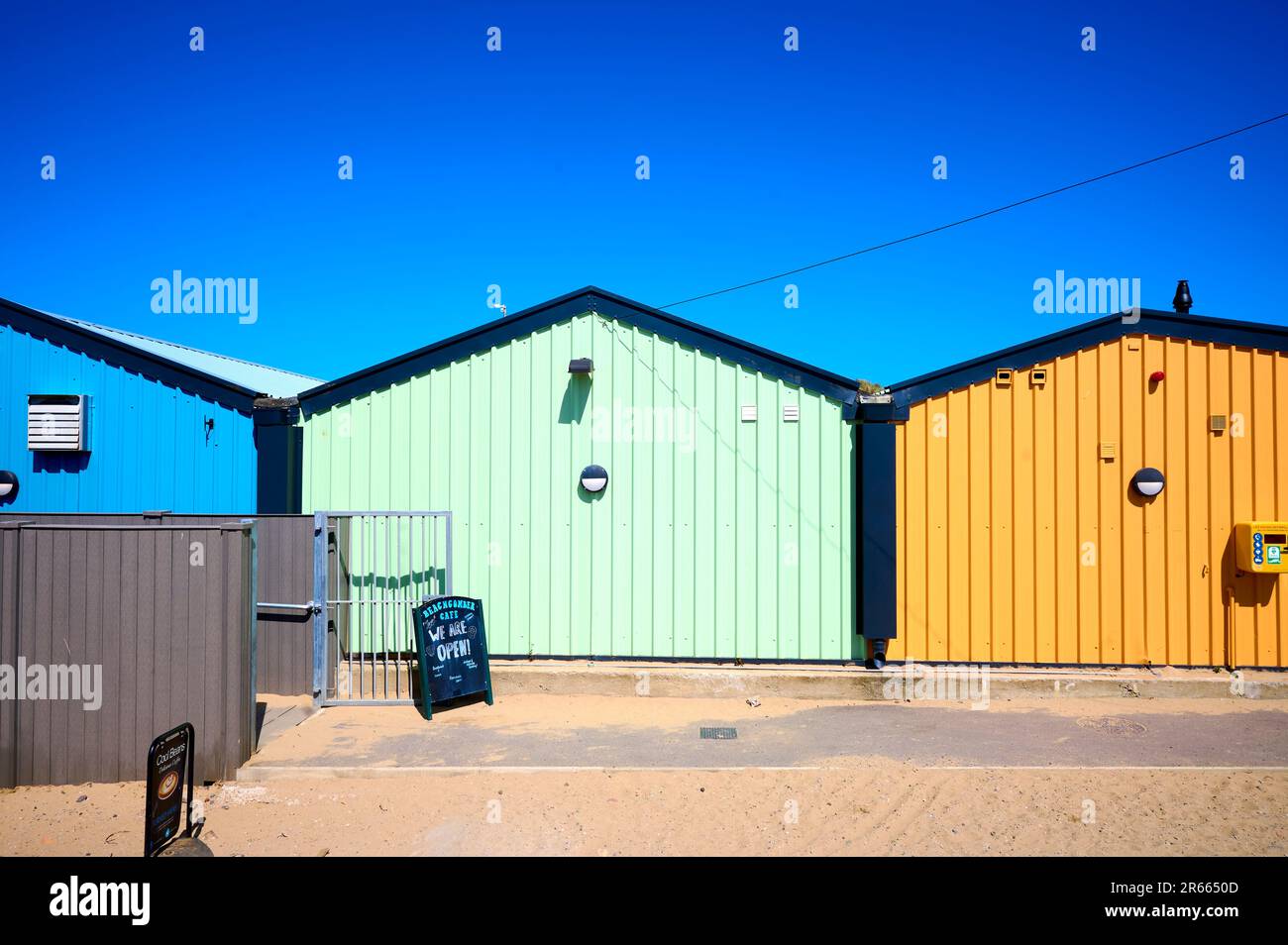 Colourful metal buildings on St Annes beach Stock Photo - Alamy