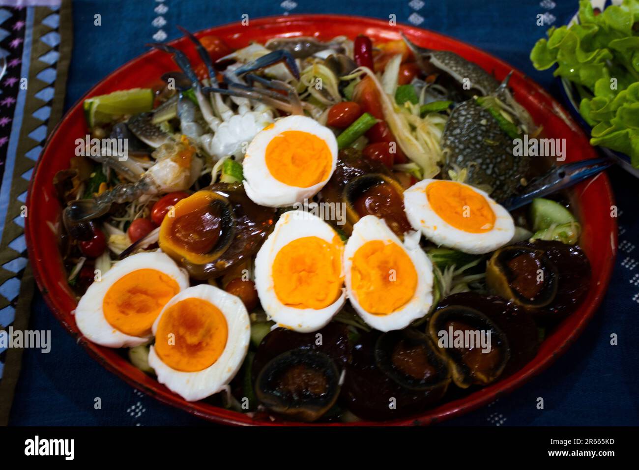 Traditional thai food local gourmet Som Tum or spicy green papaya salad ...