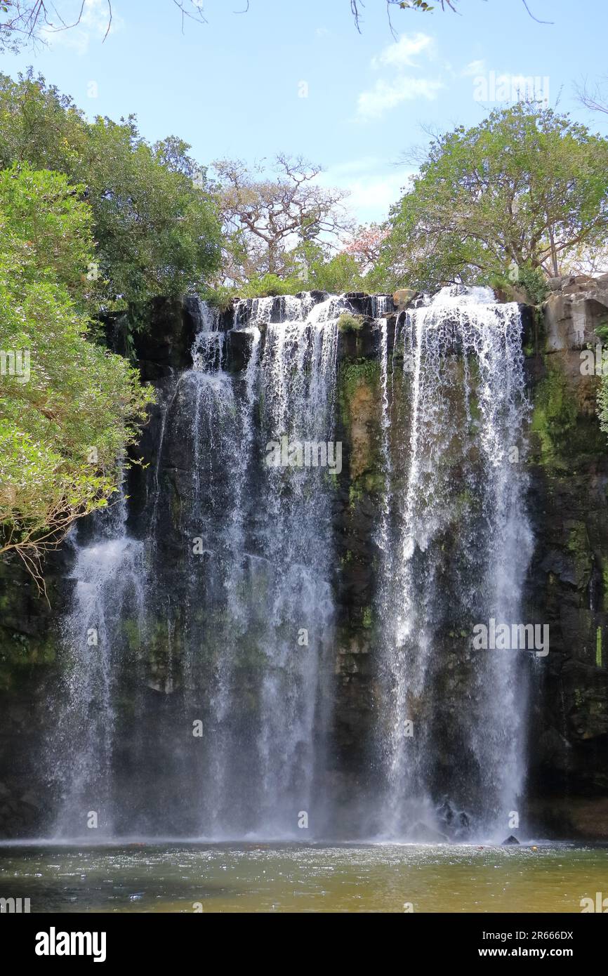 the Front view of the idyllic Llano de Cortes waterfall near Bagaces ...