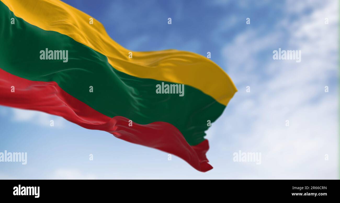 National flag of Lithuania waving in the wind on a clear day ...