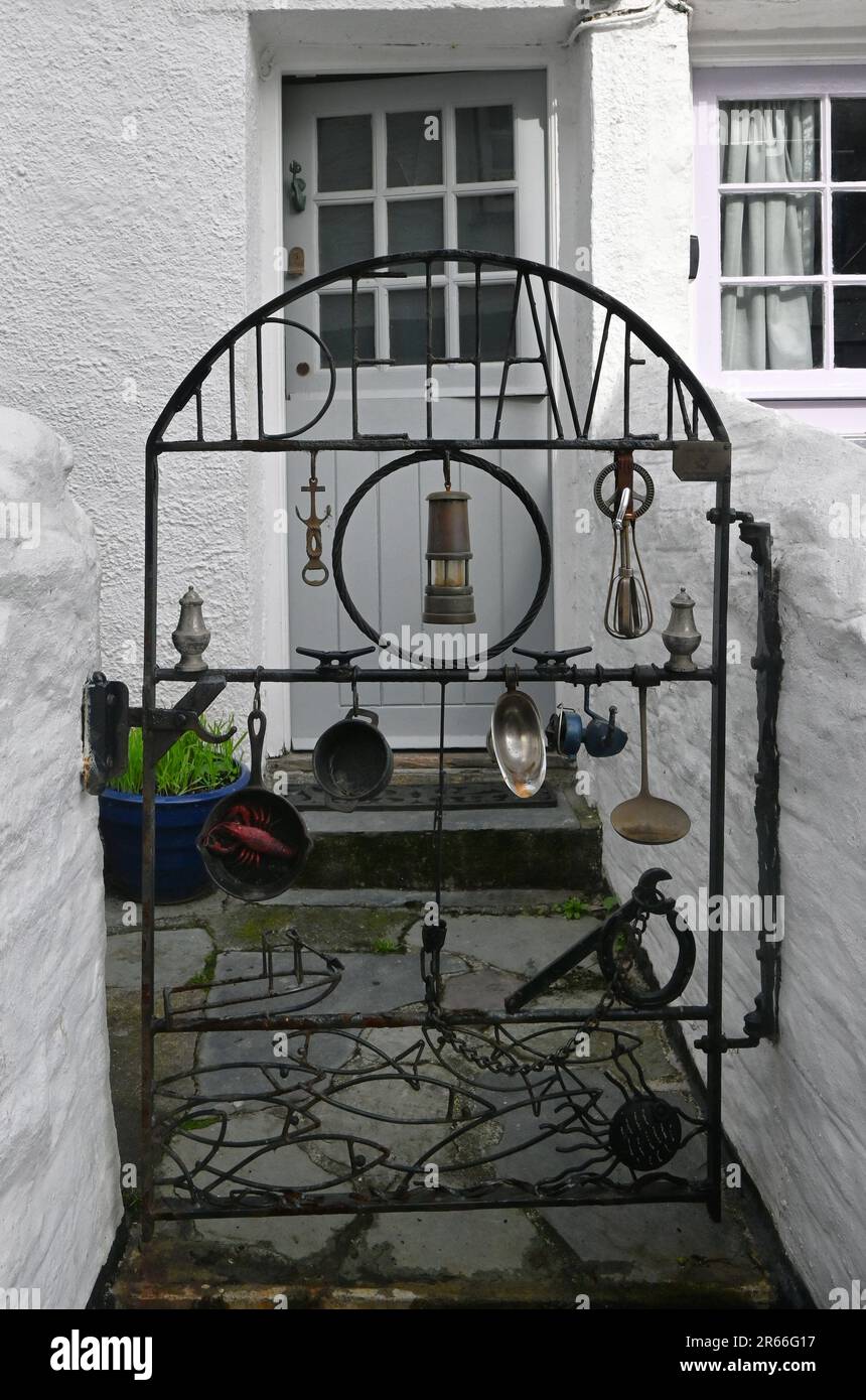 unusual fish design front gate, polperro, cornwall Stock Photo - Alamy