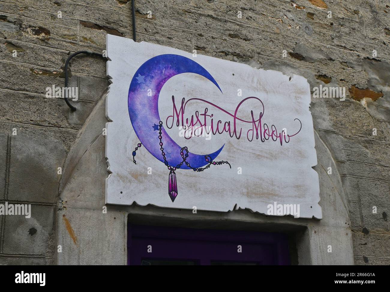 sign for mystical moon shop, polperro, cornwall Stock Photo - Alamy