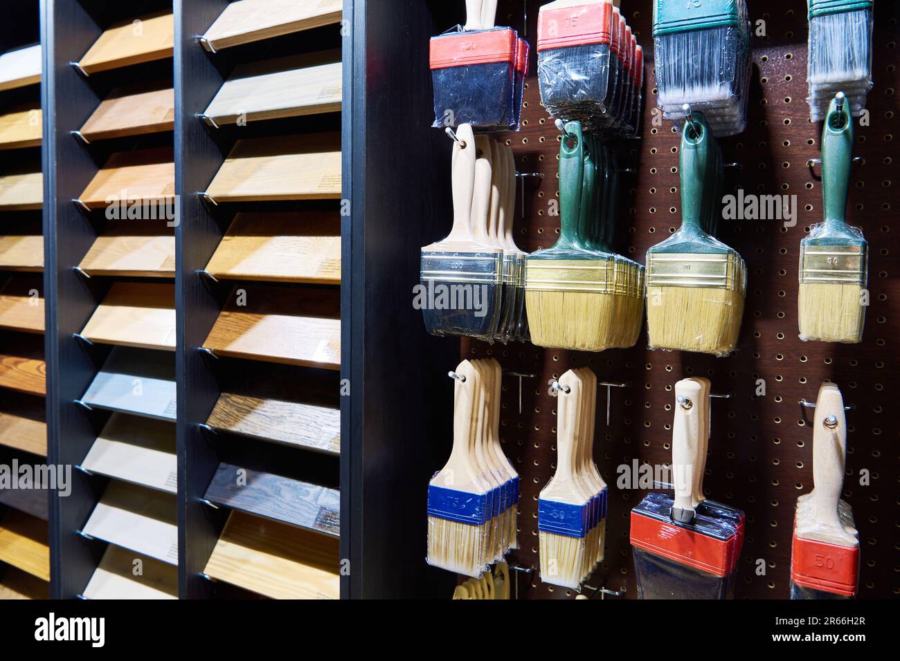 Building brushes and color samples on display at the store Stock Photo ...