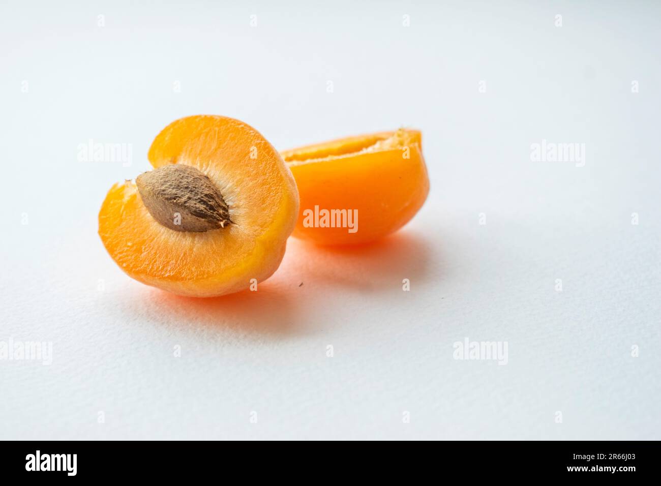 Nature's sweet treasure yellow-orange apricots, half apricot with pip ...