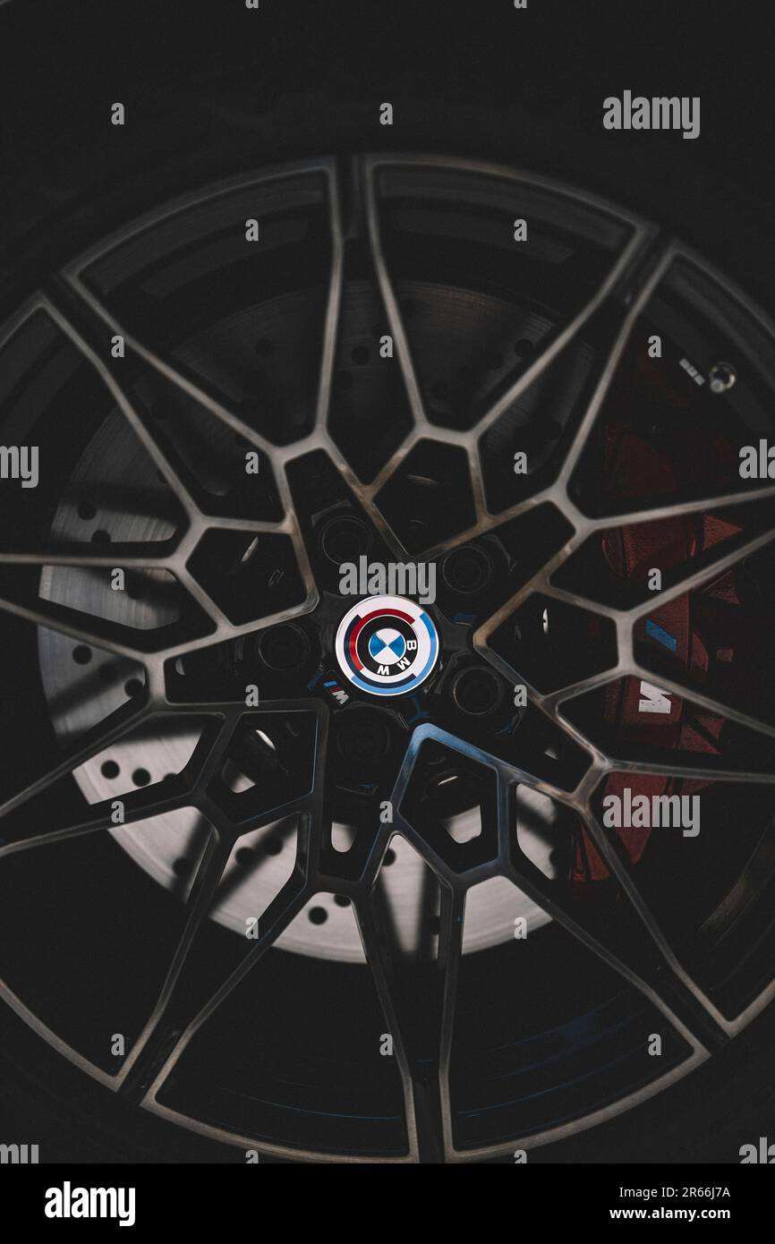 BMW wheel and tire with its logo in a last generation car Stock Photo ...