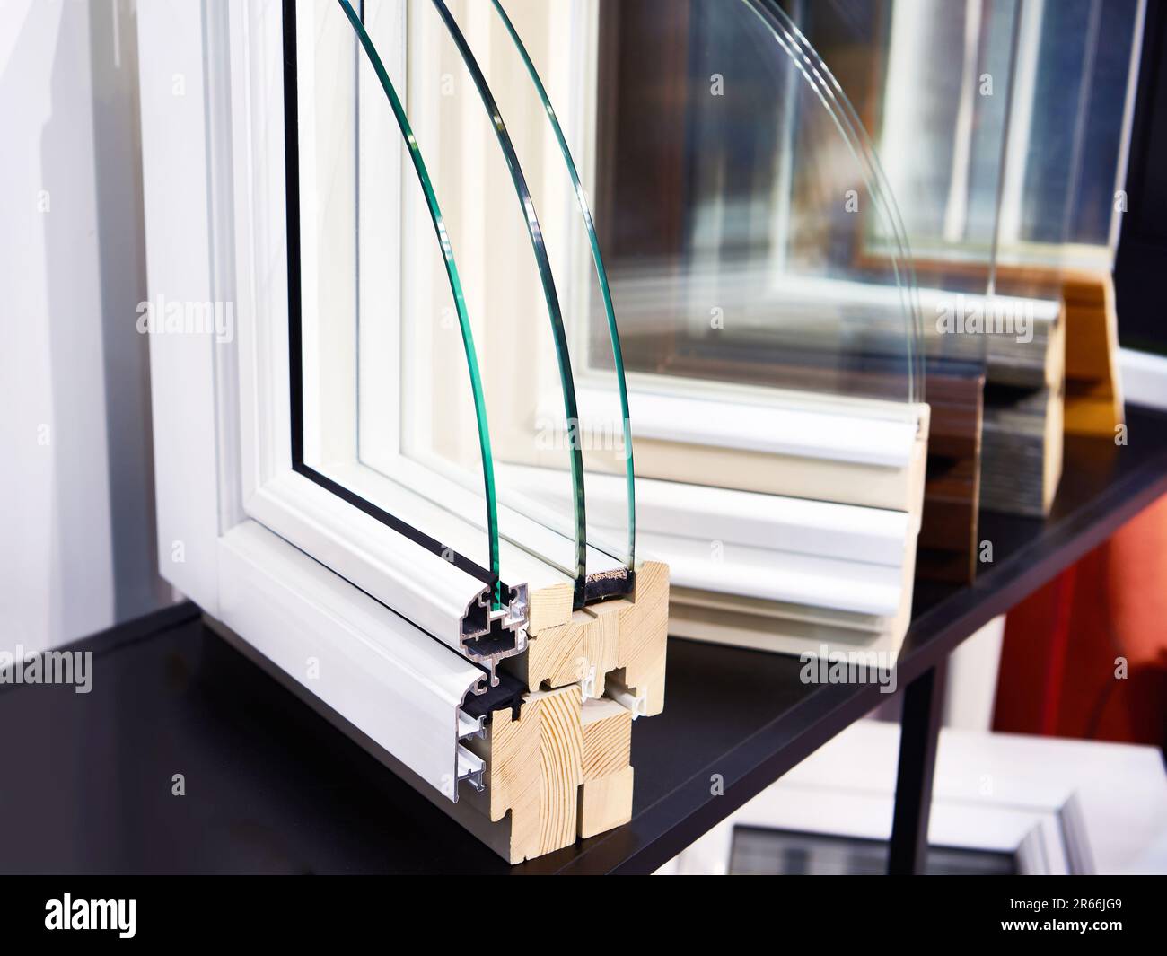 Modern wooden triple-glazed windows in the section on the construction ...