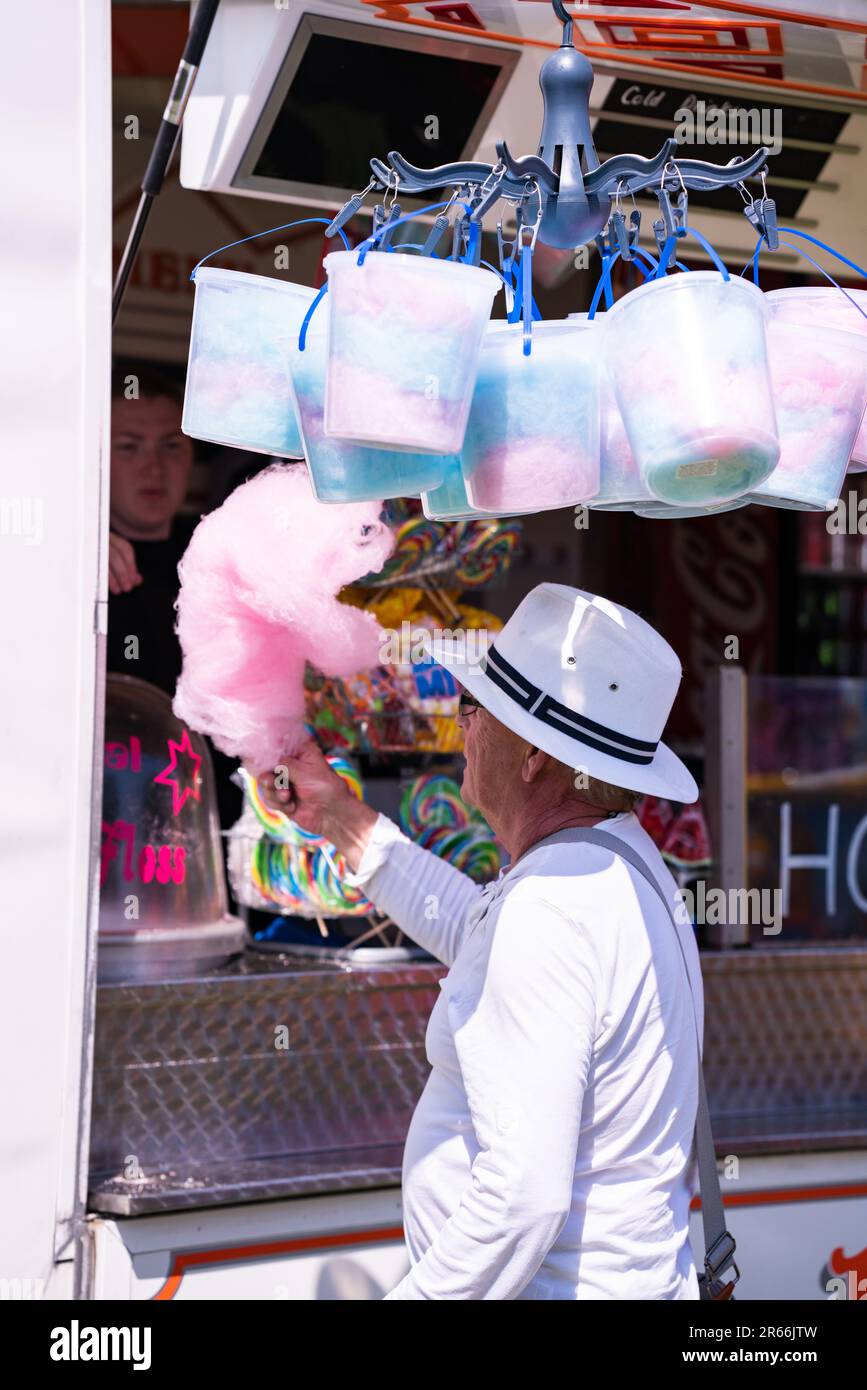 Elderly gentleman with candy floss at a country show in England Stock ...