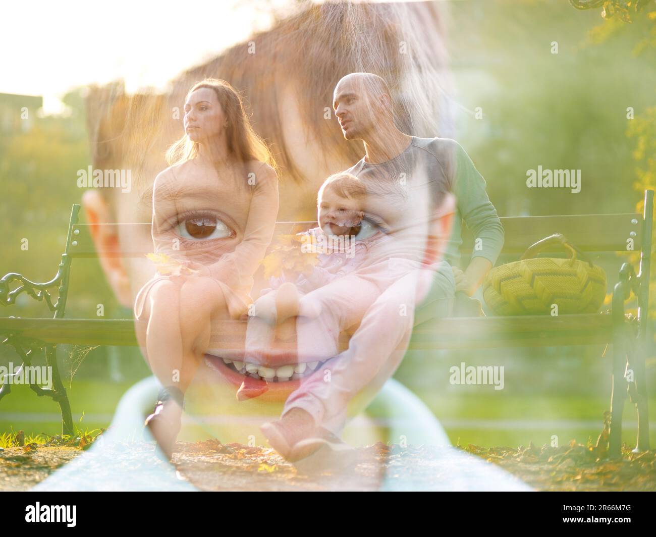 A 10-year-old smiling pretty boy and his parents in double exposure ...