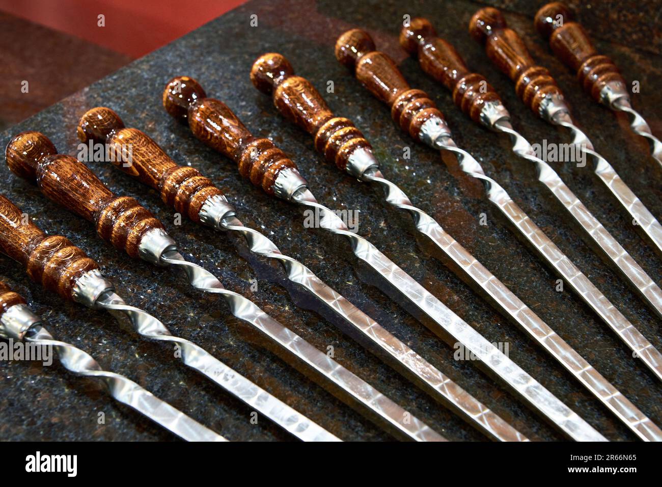 Skewers for meat with wooden handles Stock Photo - Alamy