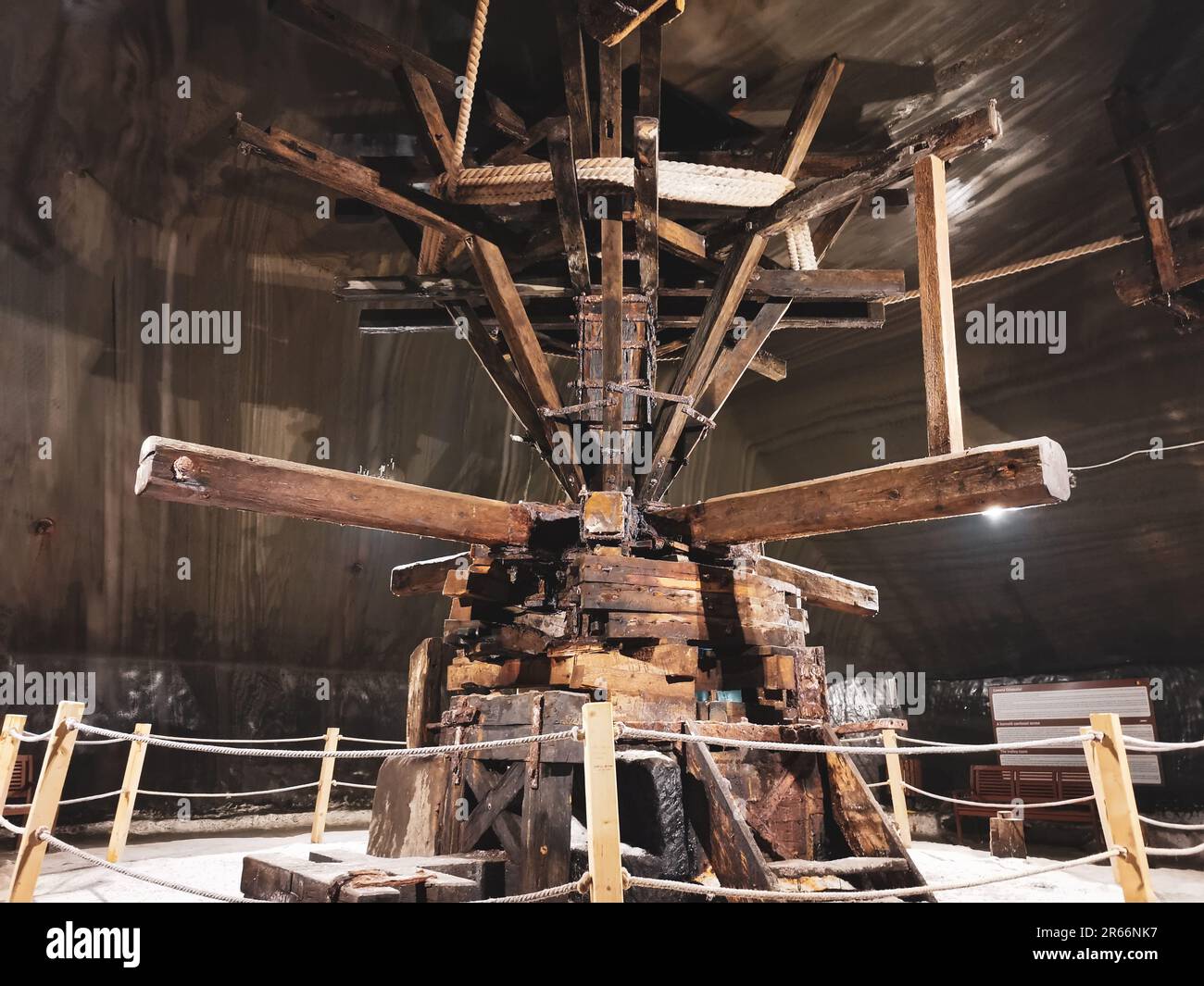 A large, sturdy wooden structure with thick, rope-bound planks at the ...