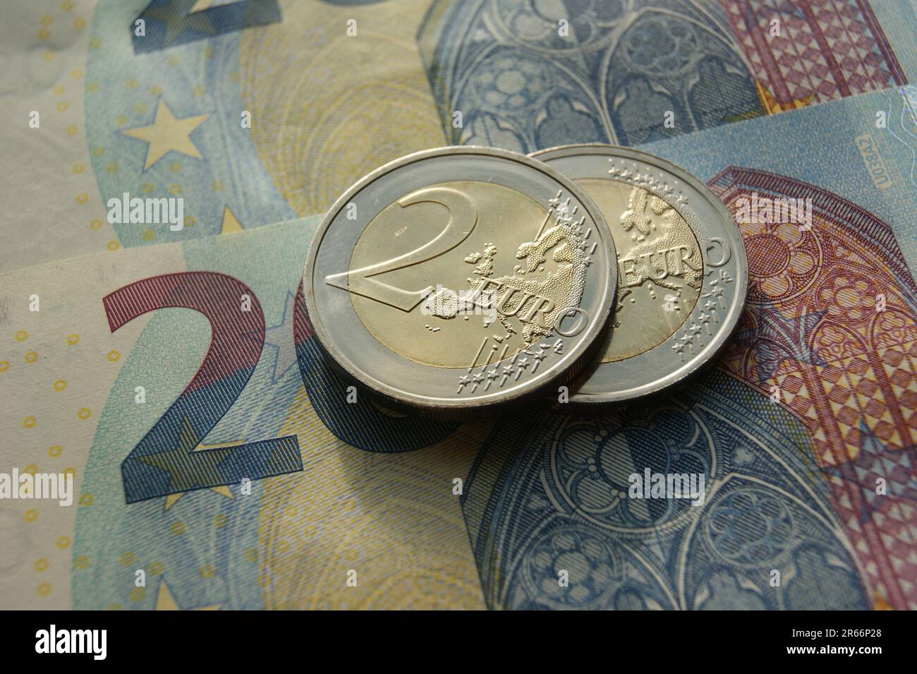 2 euro coins on 20 euro banknotes. Coin reverse. Euro coins and ...
