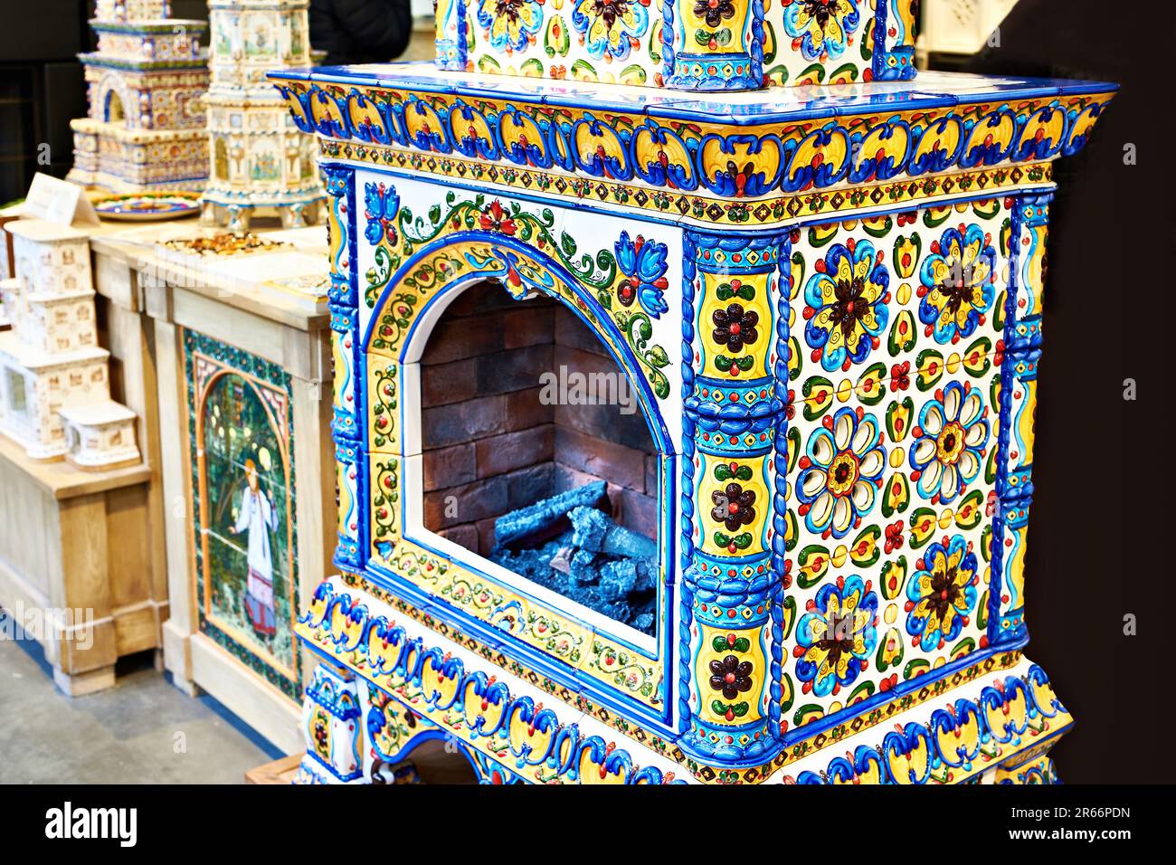 Two tier fireplace with colored glazed coloring on exhibition Stock ...