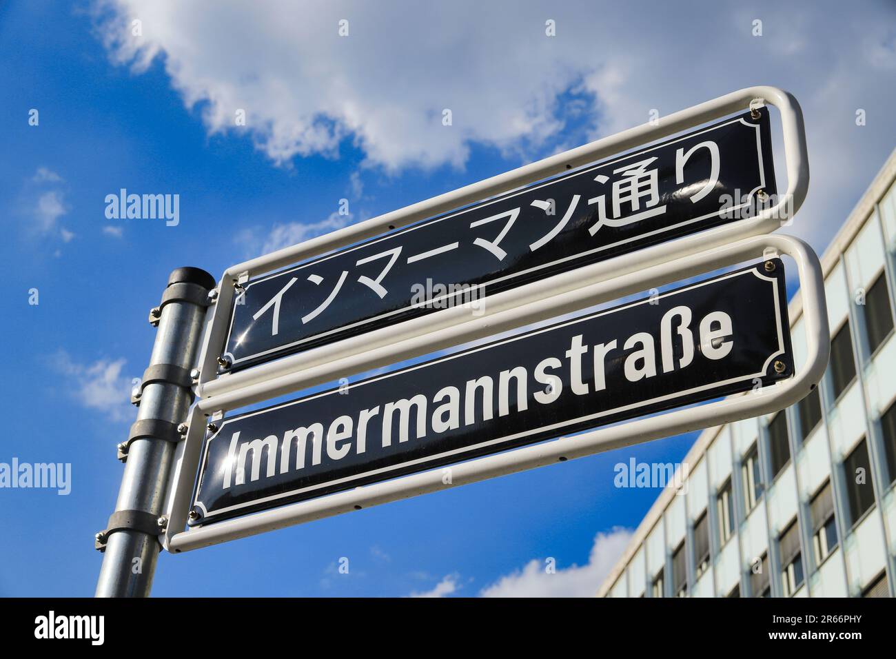 This stock photo features two street signs pointing towards a sign ...