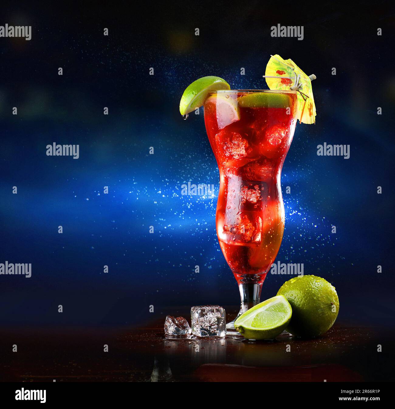 Singapore sling cocktail in tall glass against dark background Stock ...