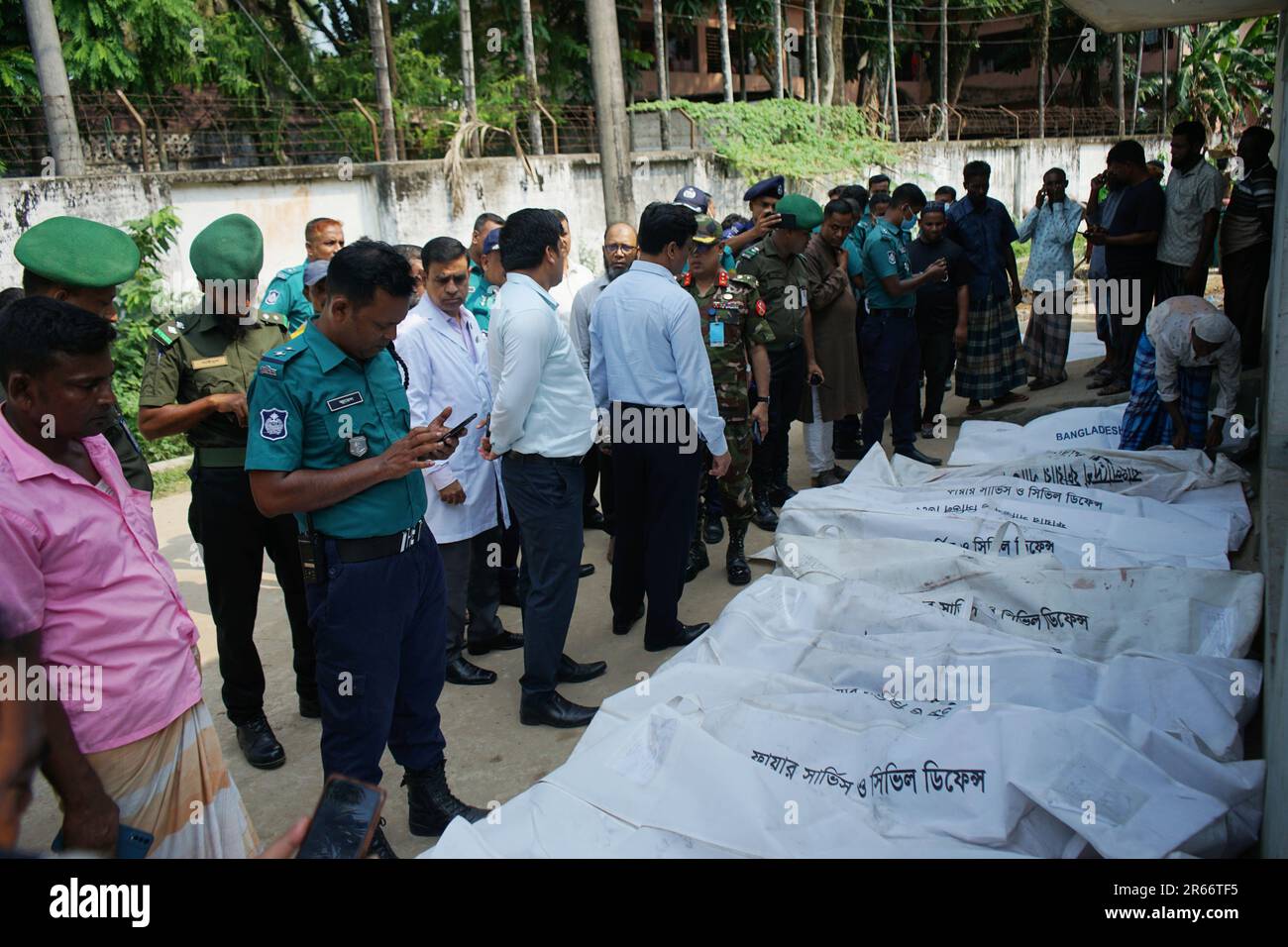 Sylhet, Bangladesh. 7th June, 2023. Dead bodies are lined up to ensure ...