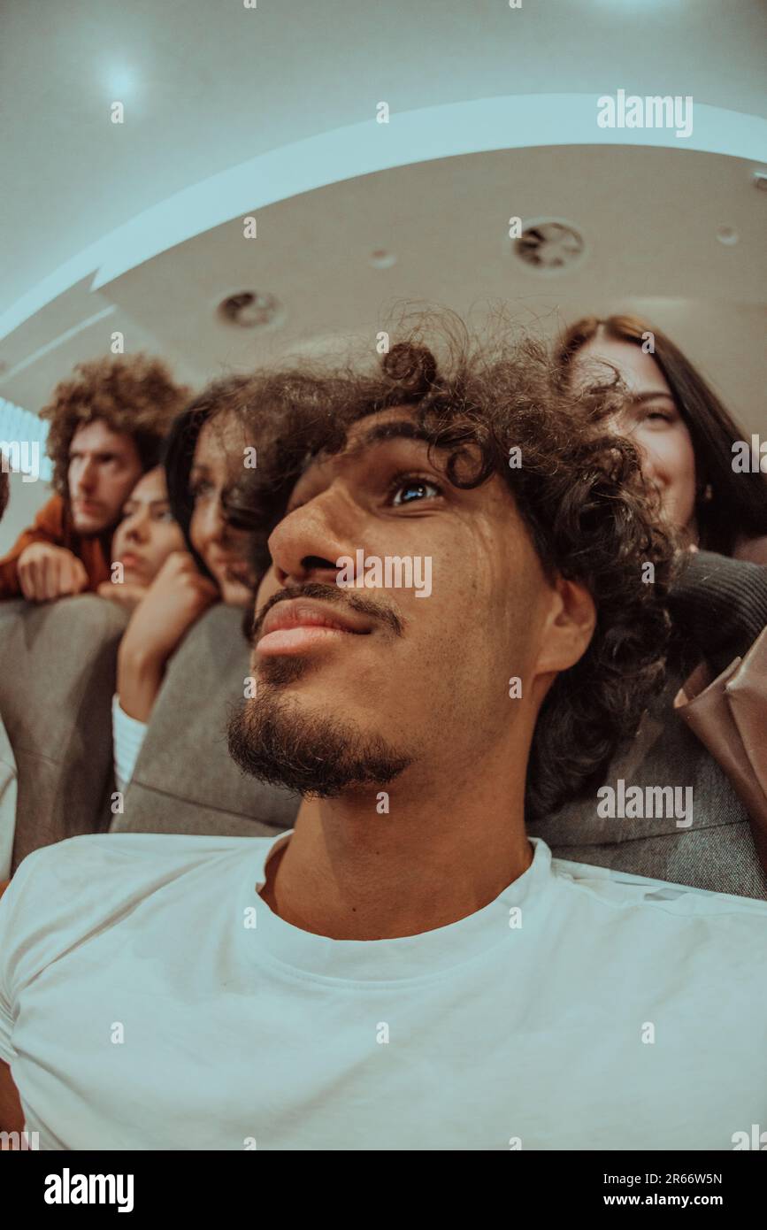 A diverse group of friends with terrified expressions together in a ...