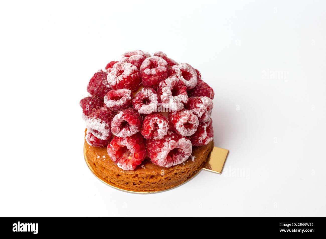 selective small round cake with raspberries Stock Photo - Alamy