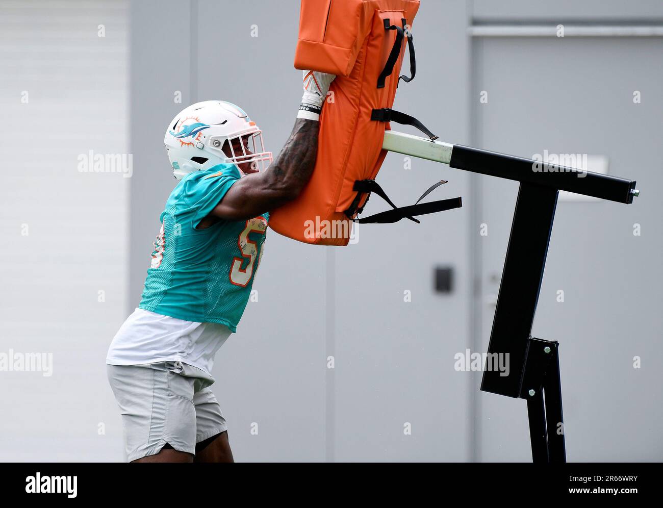 Miami Dolphins linebacker Mitchell Agude works on a drill during ...