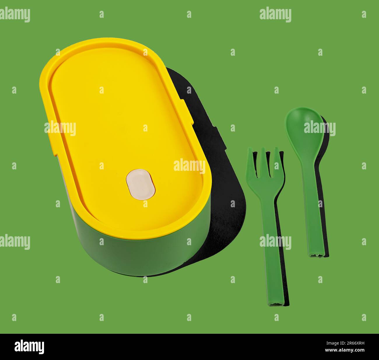 Lunch box and fork, spoon utensils. Green lunchbox container, food ...