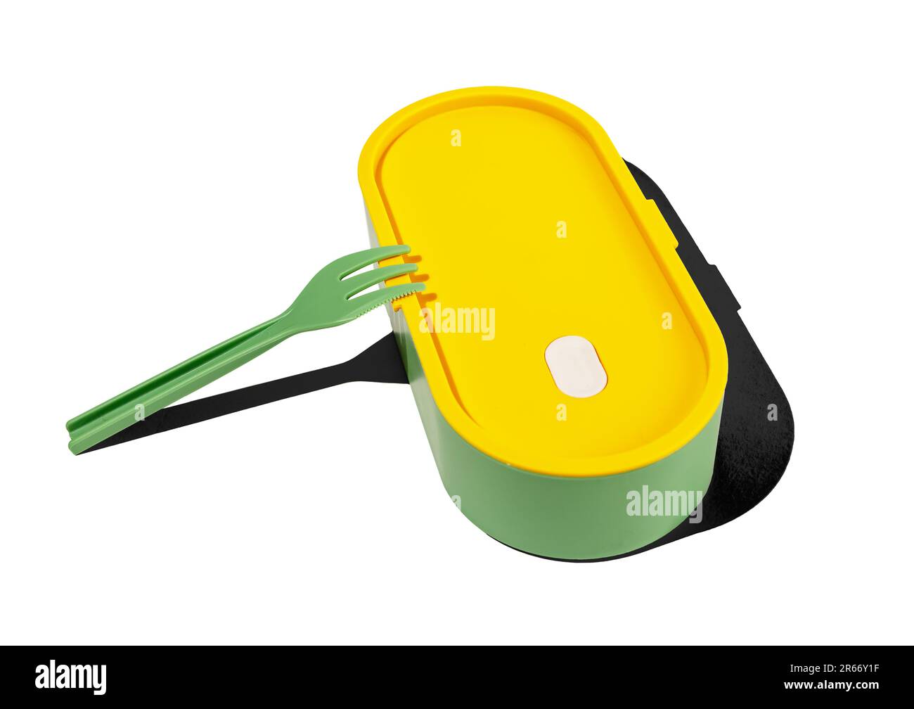 Lunch box and plastic fork. Lunchbox container closed with yellow cover ...