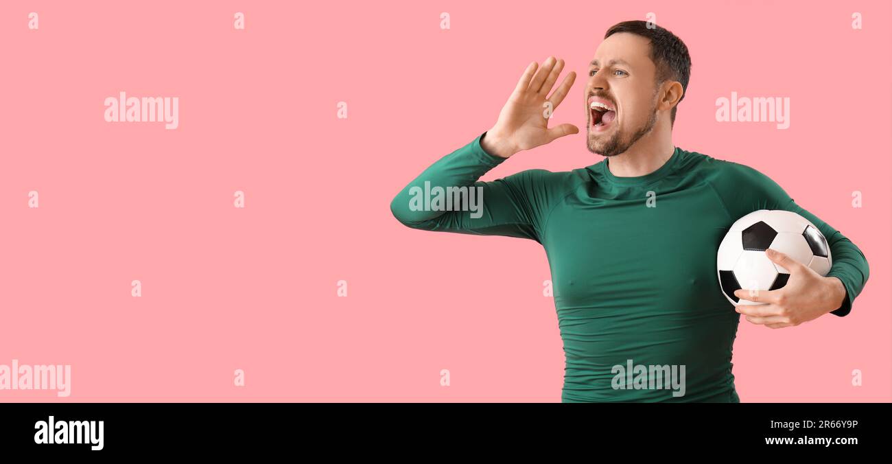 Screaming man with soccer ball on pink background with space for text ...