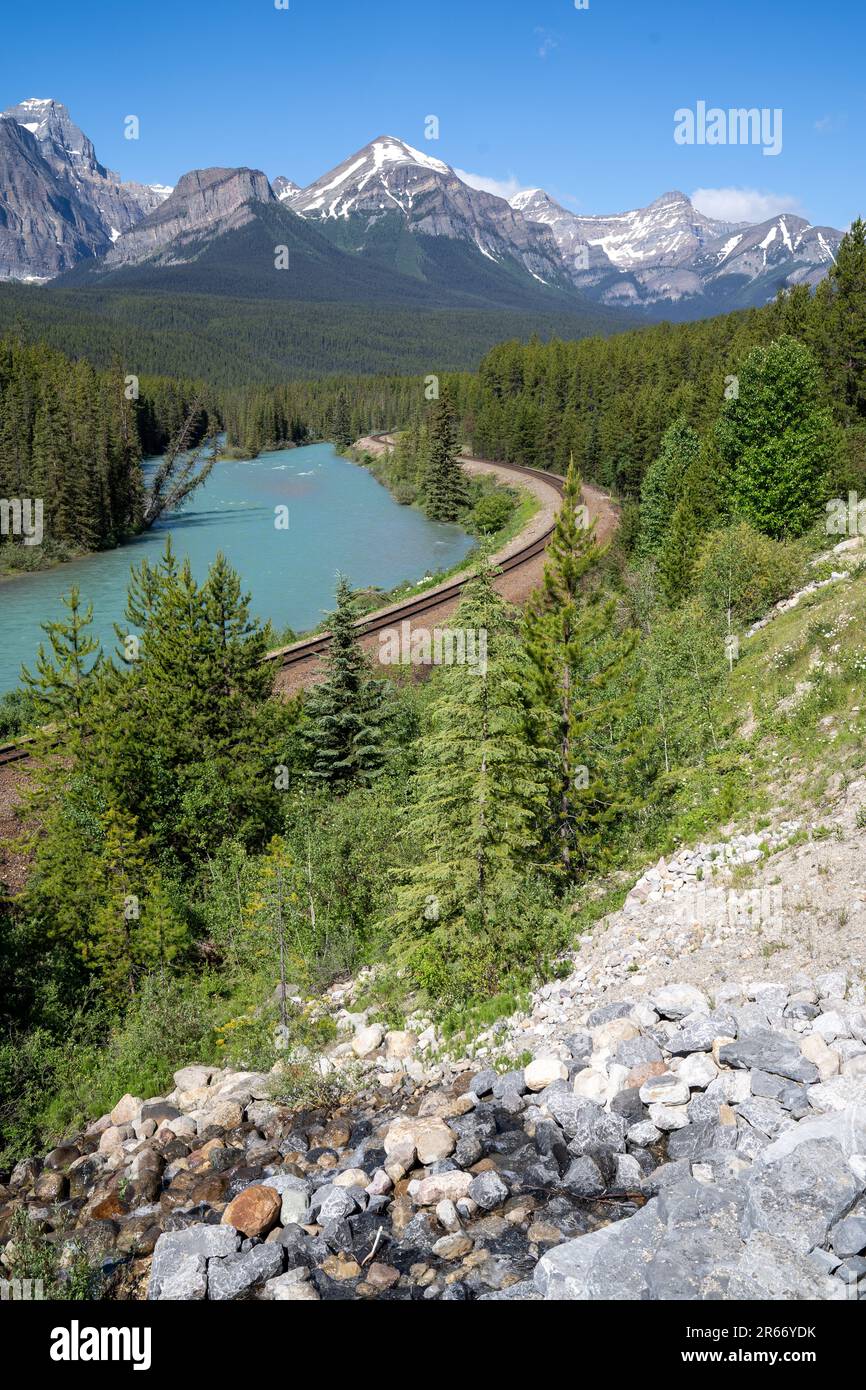 Morants Curve train tracks through the Canadian Rockies in Banff ...