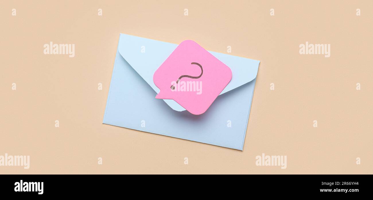 Sticky paper with question mark and envelope on beige background Stock ...