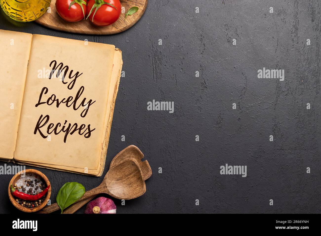 Top-down view of a kitchen table with ingredients, utensils, and an ...