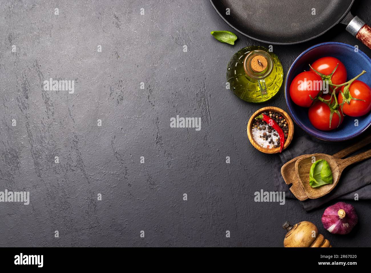 Top-down view of a kitchen table with ingredients, utensils, and copy ...