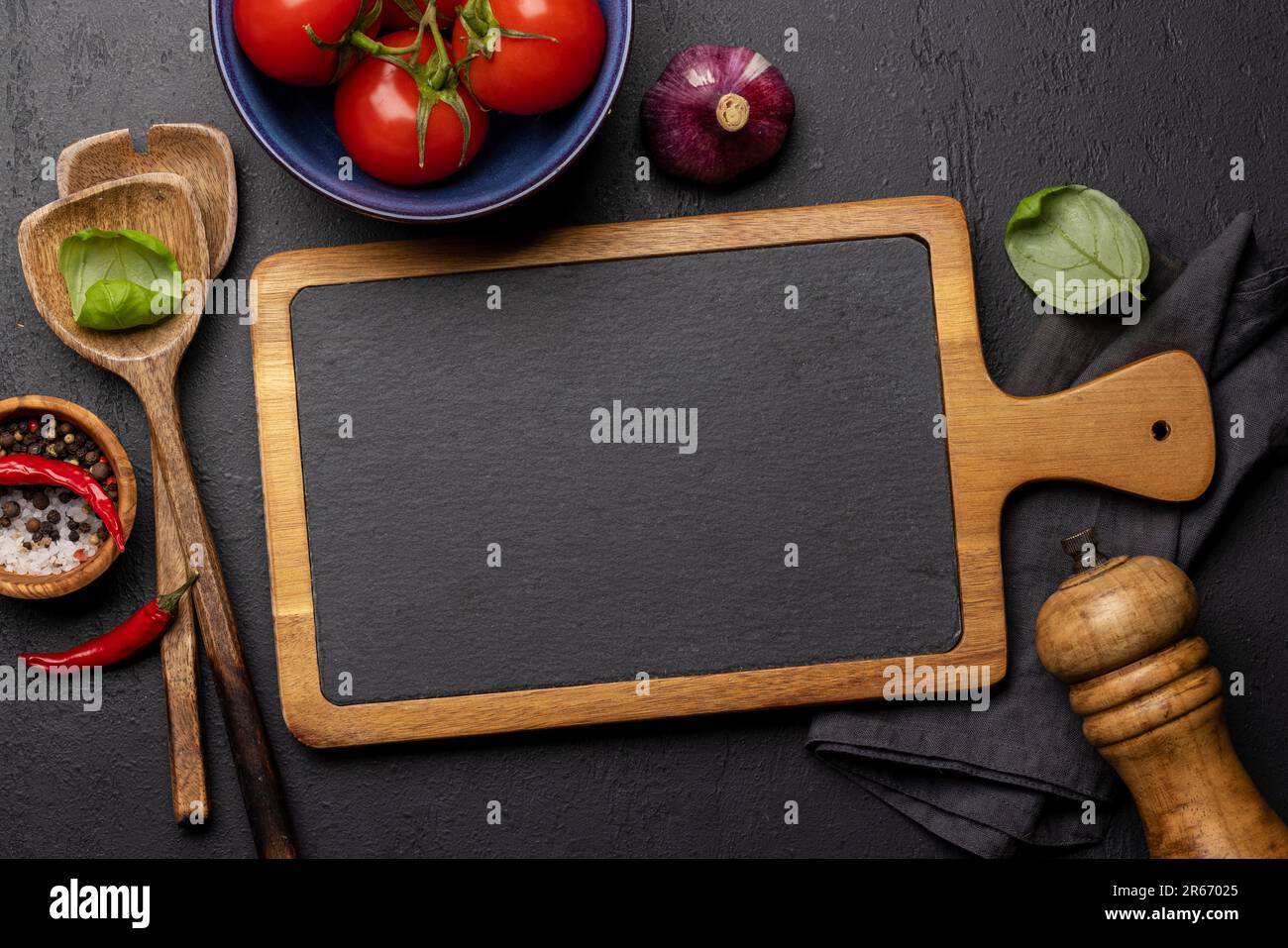Top-down view of a kitchen table with ingredients, utensils, and ...