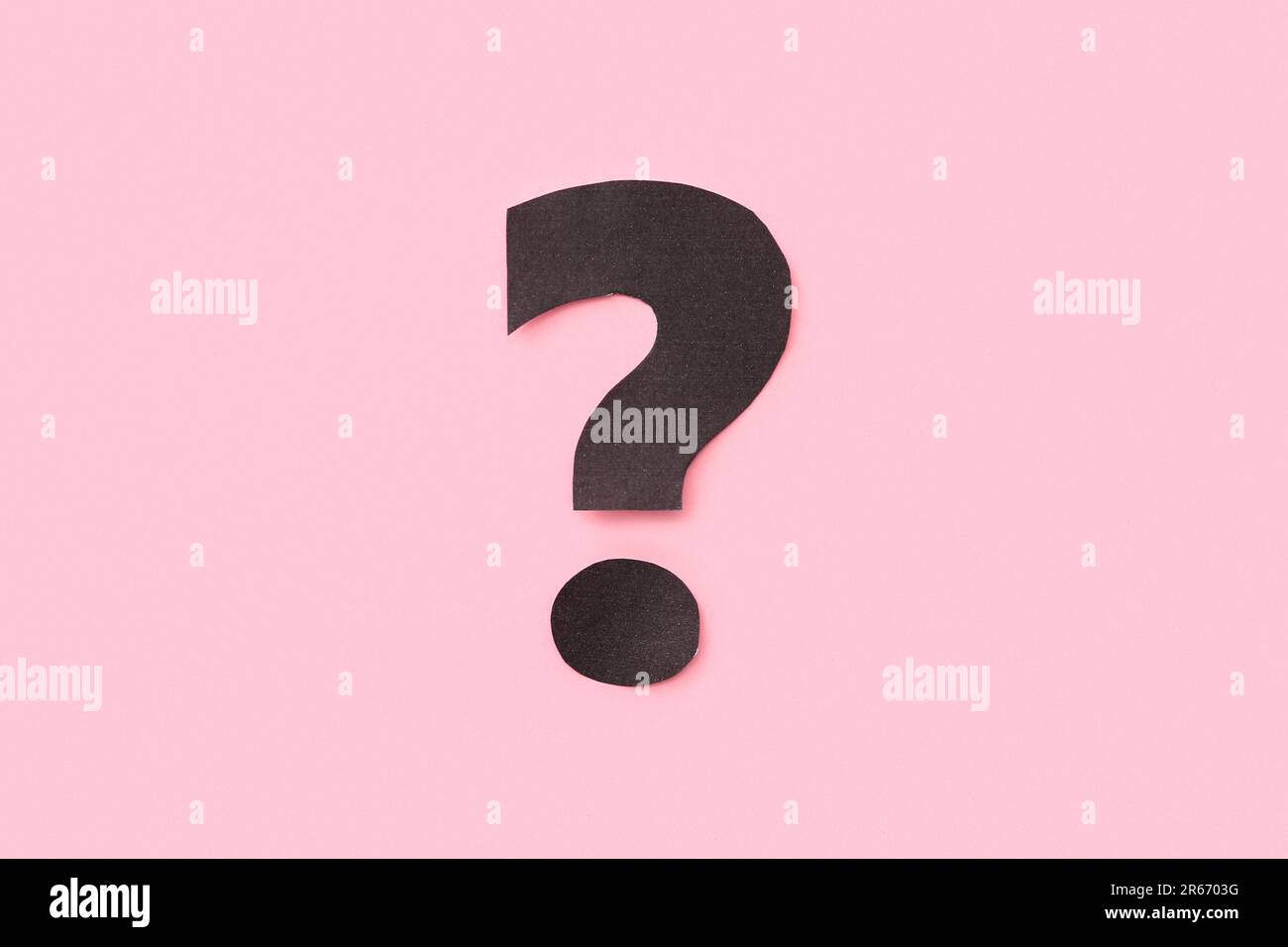 Paper question mark on pink background Stock Photo - Alamy