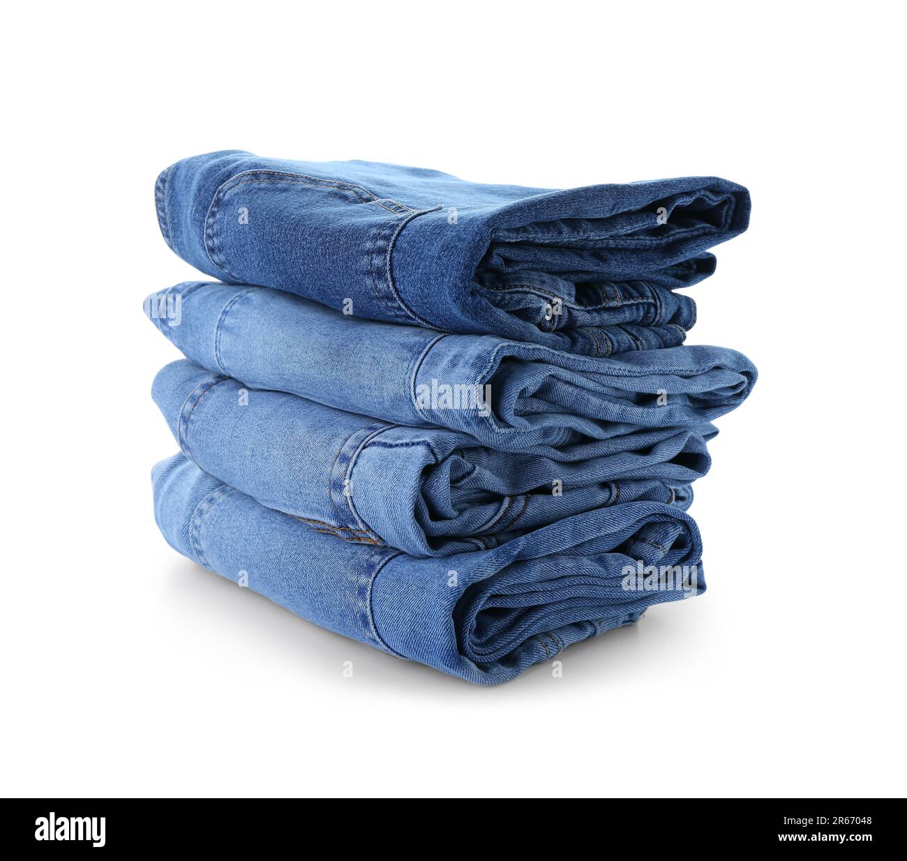 Stack of jeans on white background Stock Photo - Alamy