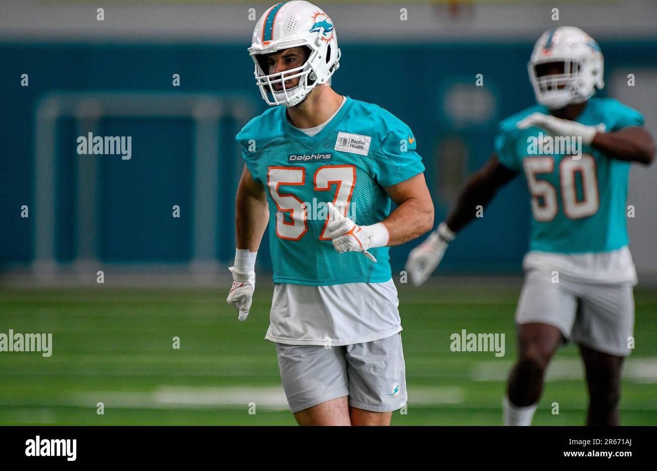 Miami Dolphins linebacker Zeke Vandenburgh (57) does drills during ...