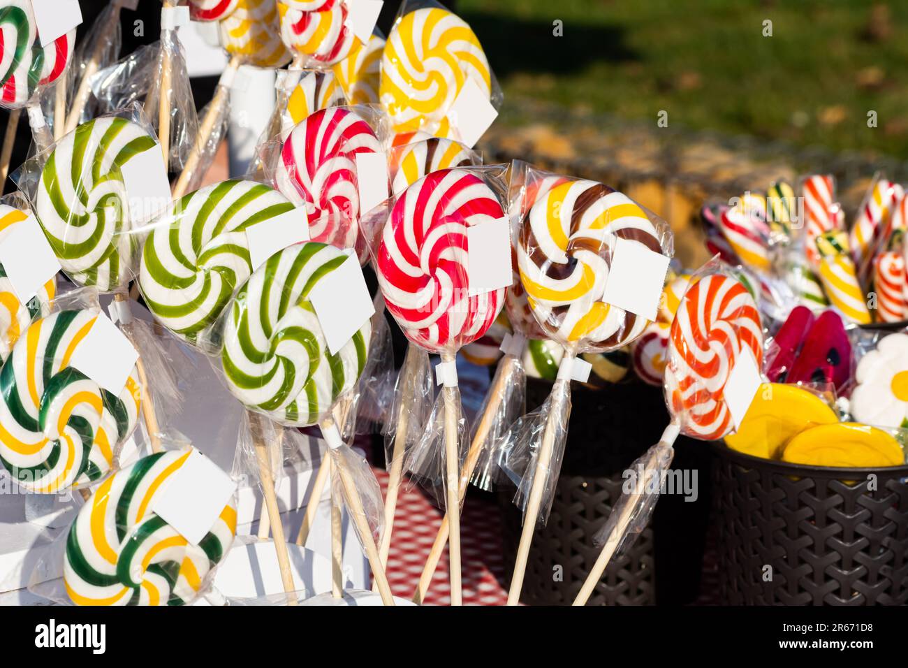 Lollipops delicious wrapped in cellophane. Colorful swirly lollipops ...