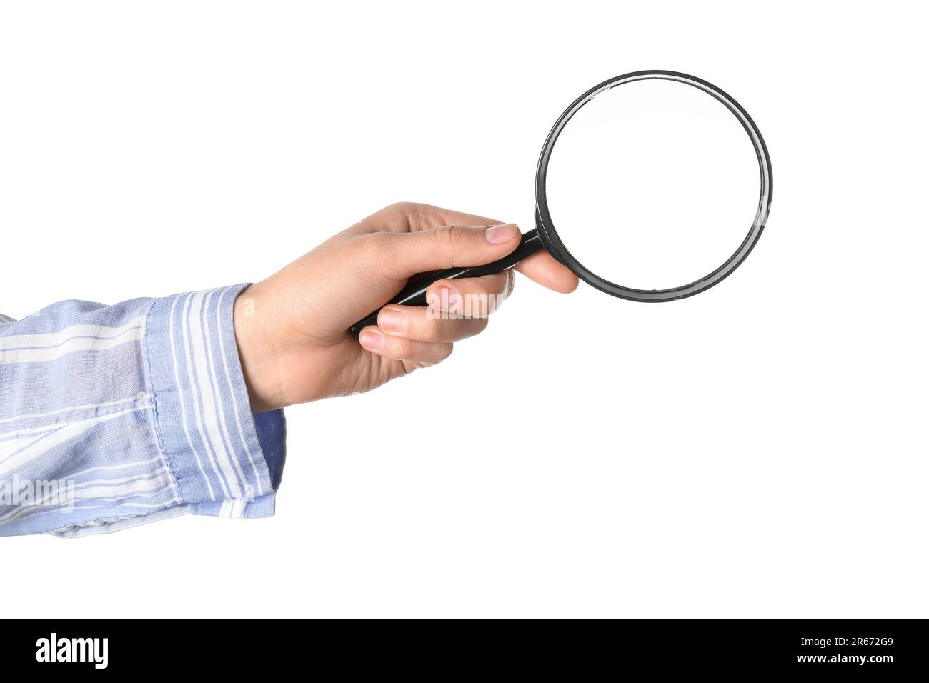 Female hand with magnifier isolated on white background Stock Photo - Alamy