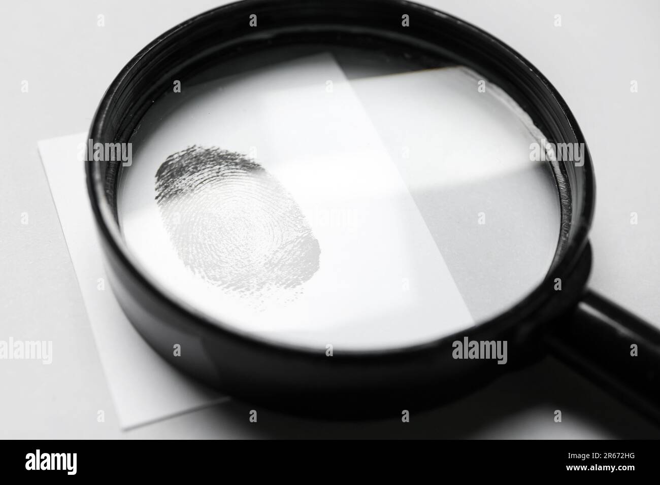 Fingerprint magnifier glass hi-res stock photography and images - Alamy