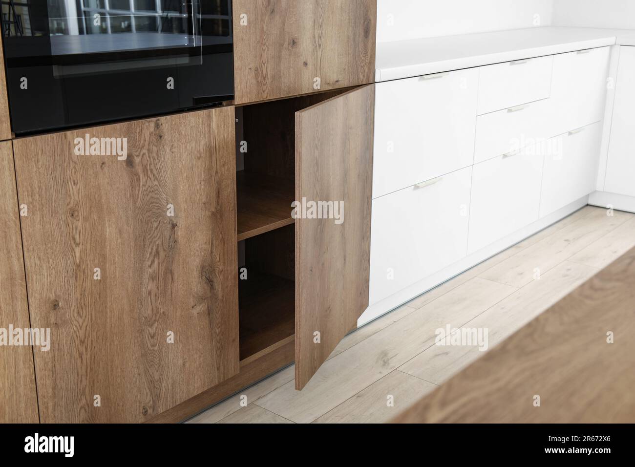 Interior of modern kitchen with wooden drawers Stock Photo - Alamy