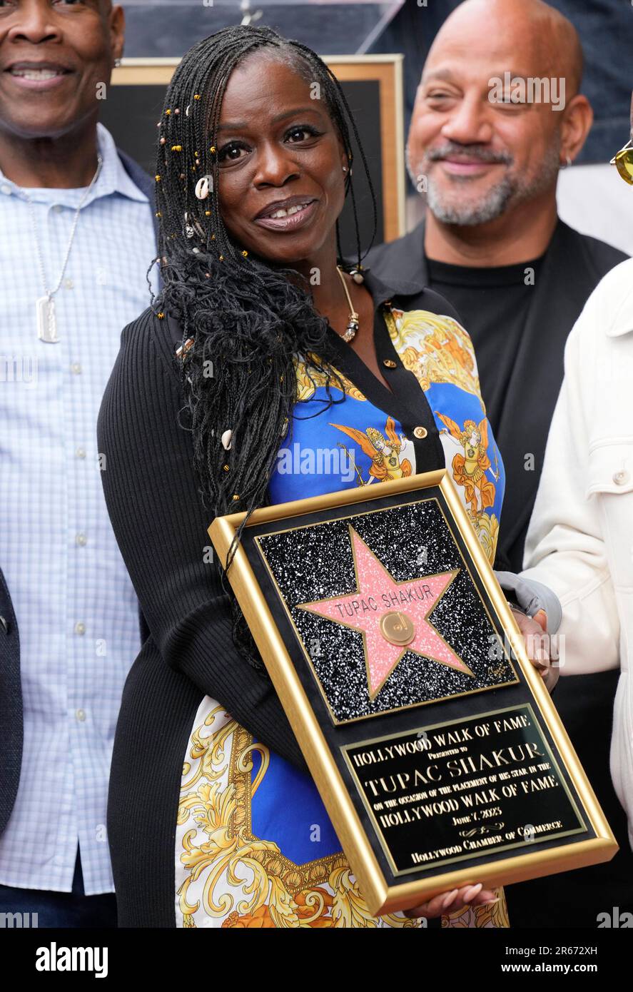 Sekyiwa Set Shakur Holds A Replica Of Her Late Brother Tupac Shakurs New Star On The