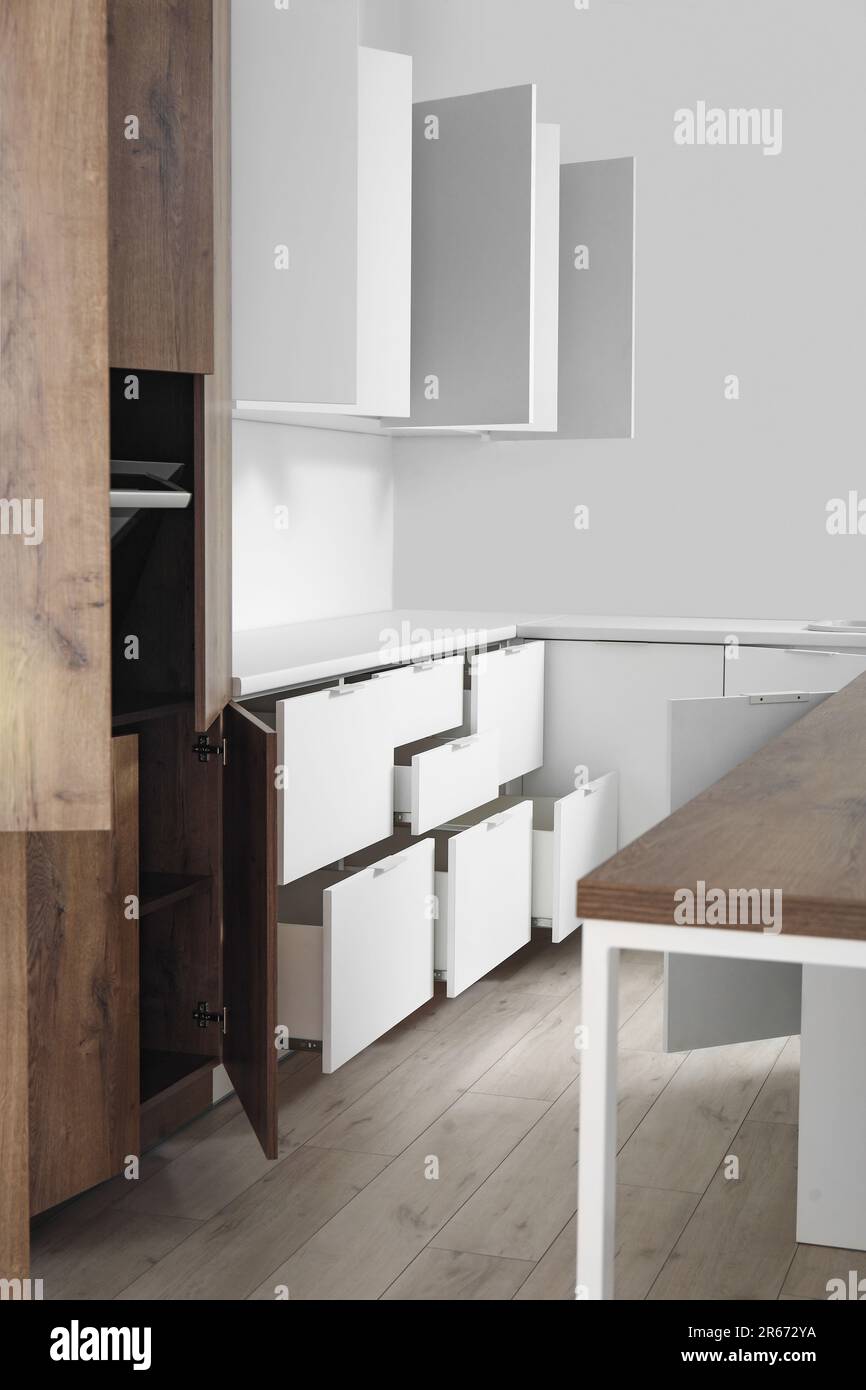 Interior of modern kitchen with drawers Stock Photo - Alamy