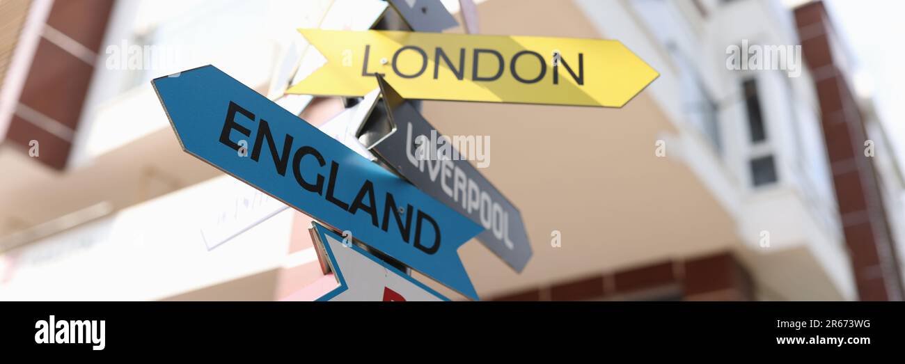 Road sign with pointers of different cities and countries Stock Photo ...