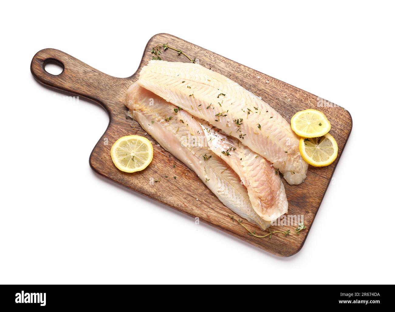 Wooden board with raw cod fillet on white background Stock Photo - Alamy